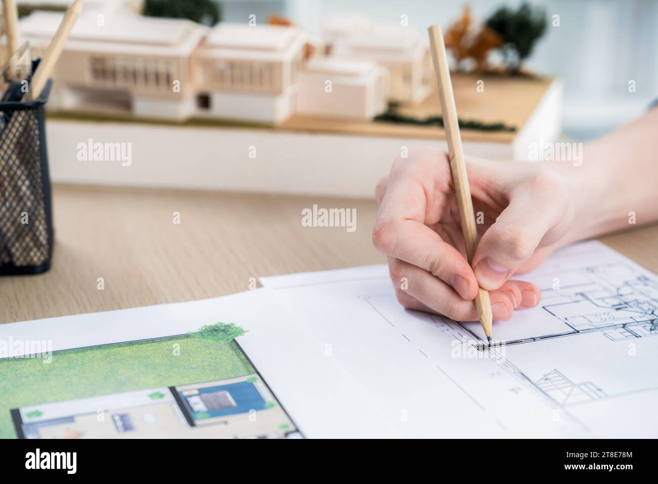 Closeup hand drafting interior house design by architect designer ...
