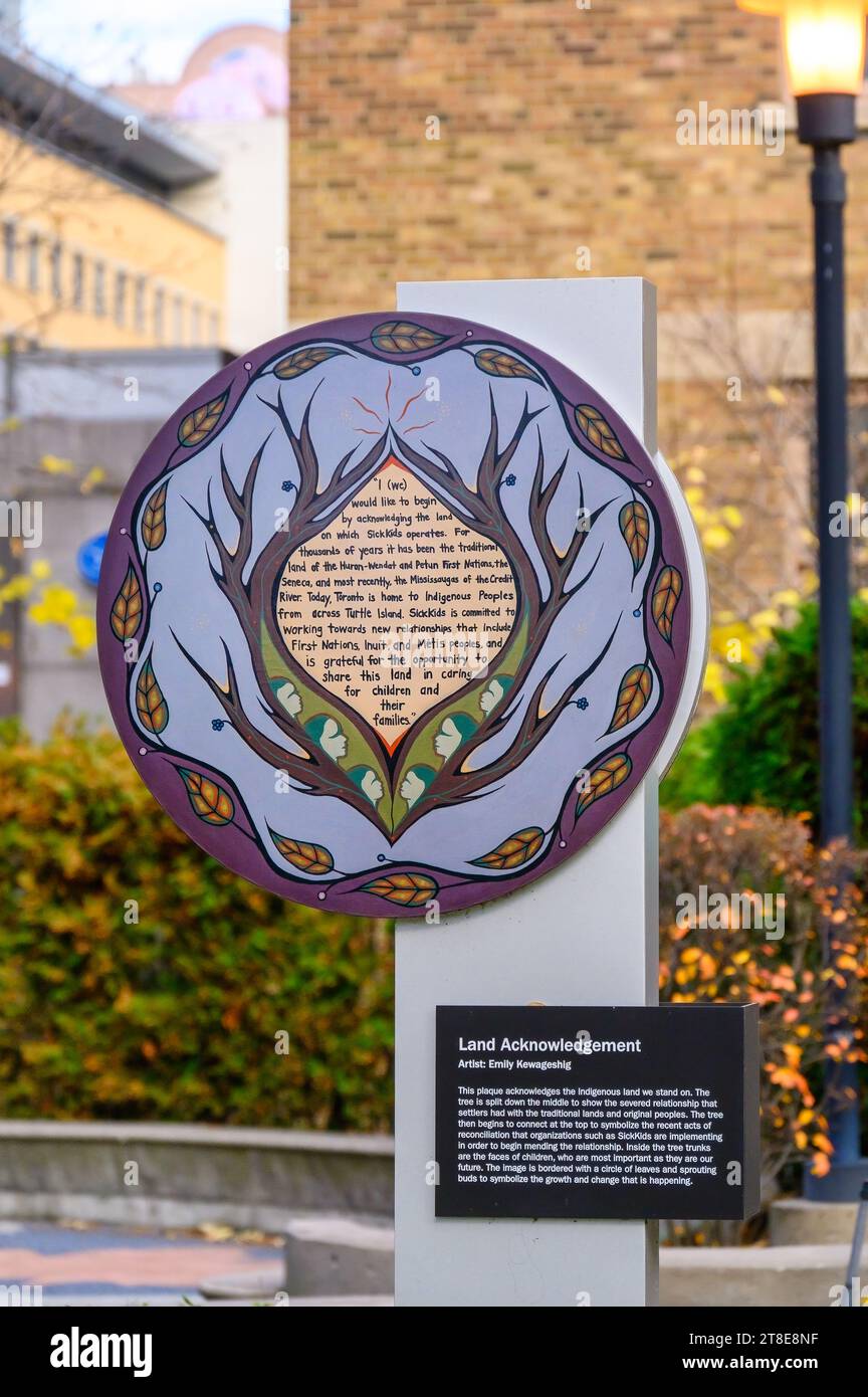 Art plaque named Land Acknowledgment by Emily Kewageshing. It is ...