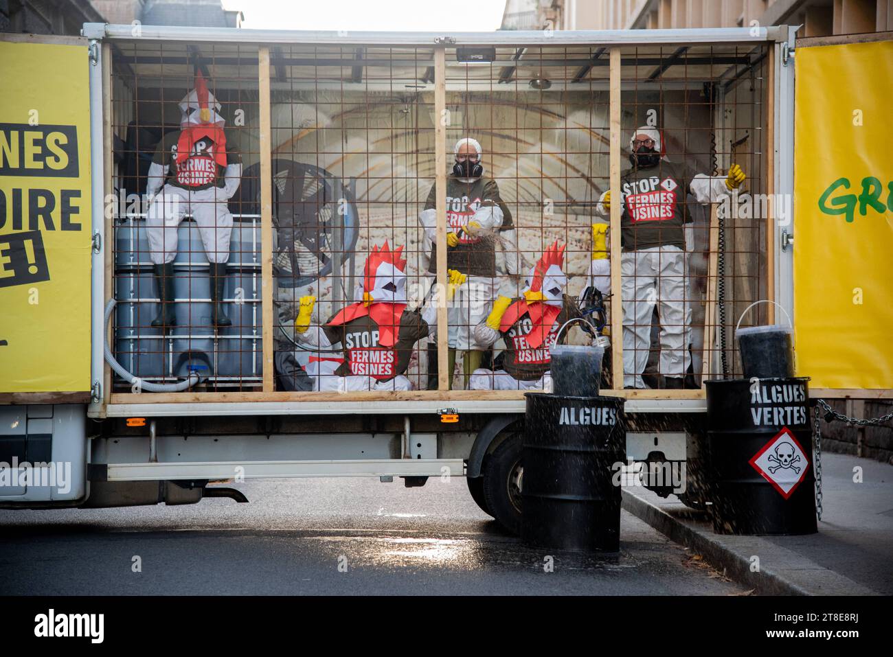 Paris, France. 19th Nov, 2023. Greenpeace activists wearing masks in ...