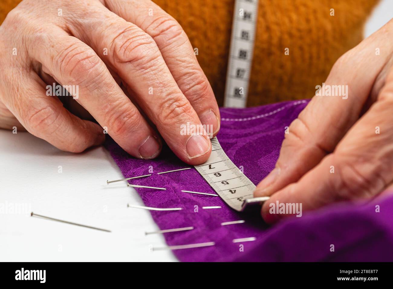 Extreme close-up horizontal photo, hands of mature adult woman ...
