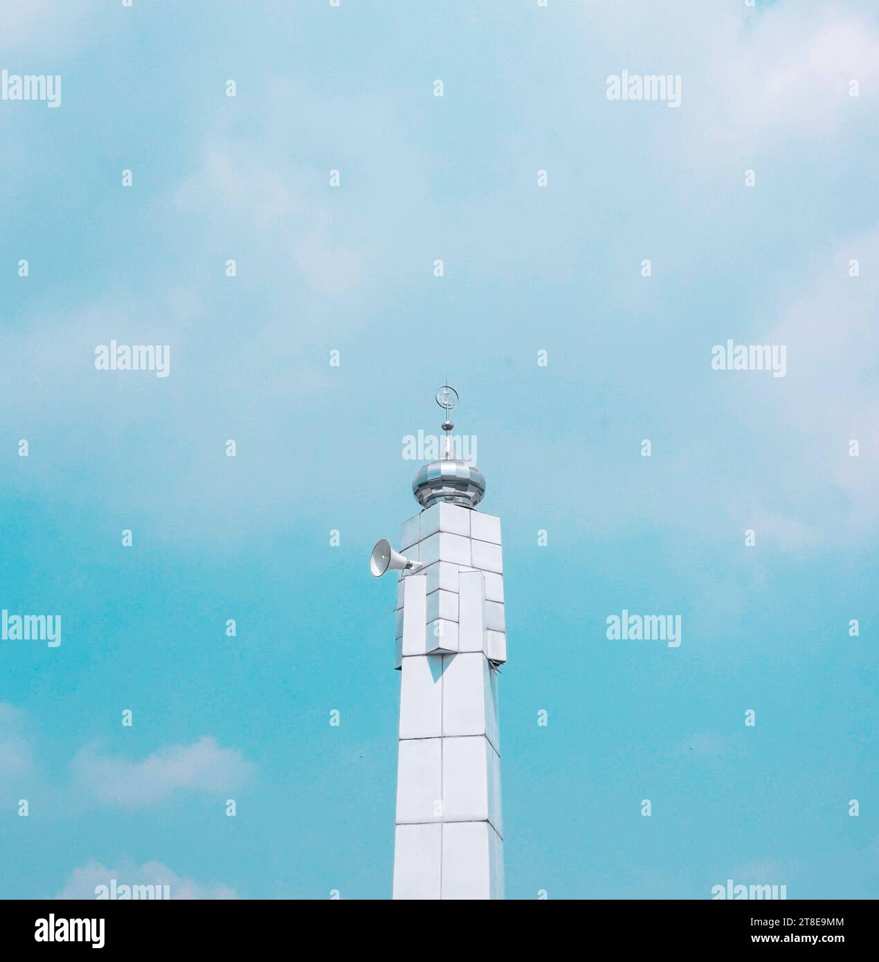 mosque megaphone tower with bright blue sky as background Stock Photo ...