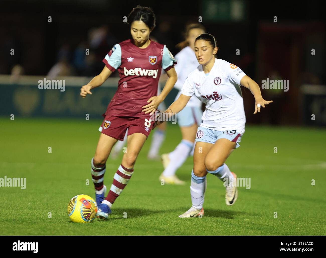 L-R Riko Ueki of West Ham United WFC holds of Maz Pacheco of Aston ...