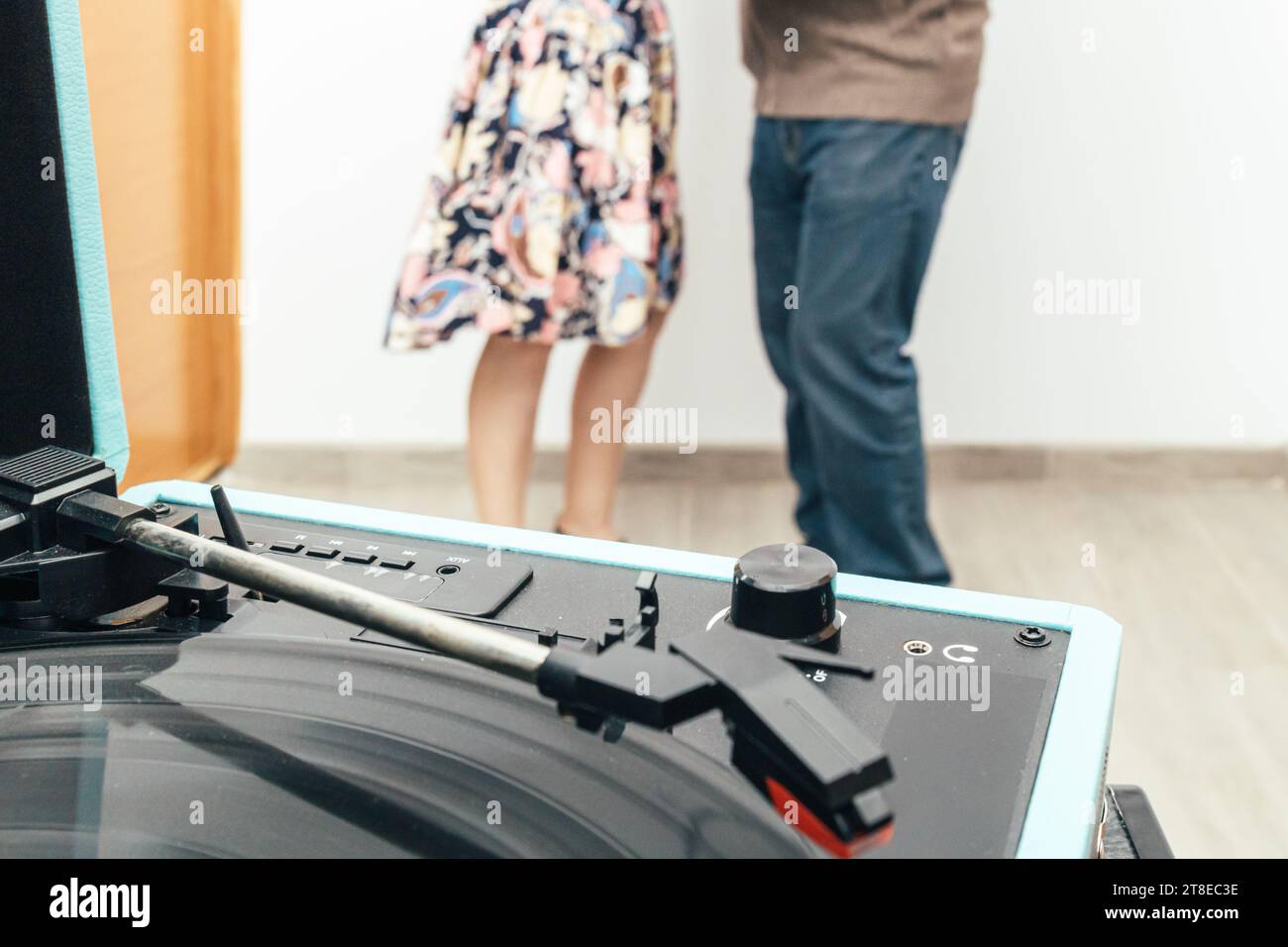 Extreme close up horizontal photo of a record player and in the ...