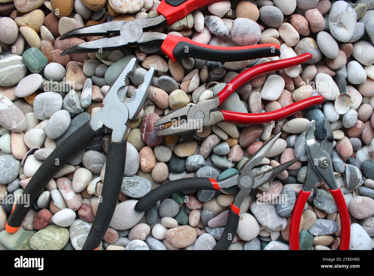 Concept Photo With Set Of Different Types Of Mechanics Pliers On Smooth ...
