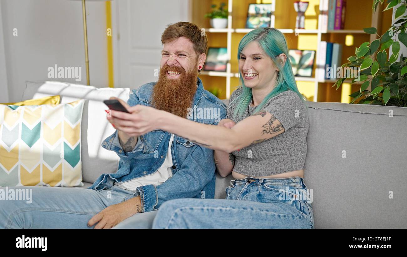 Fighting for the tv remote hi-res stock photography and images - Alamy
