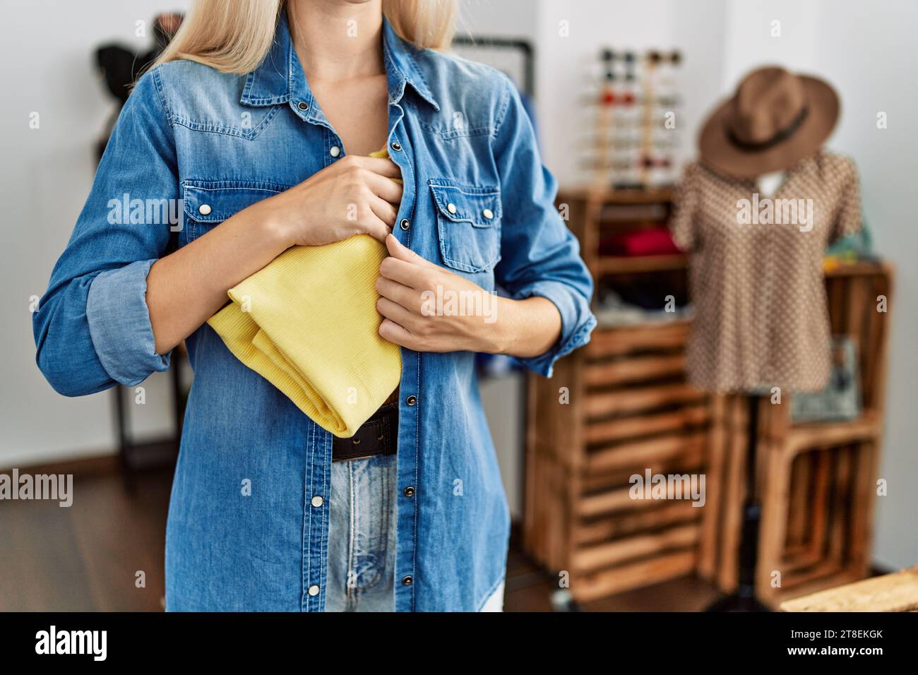 Woman stealing clothes hi-res stock photography and images - Alamy