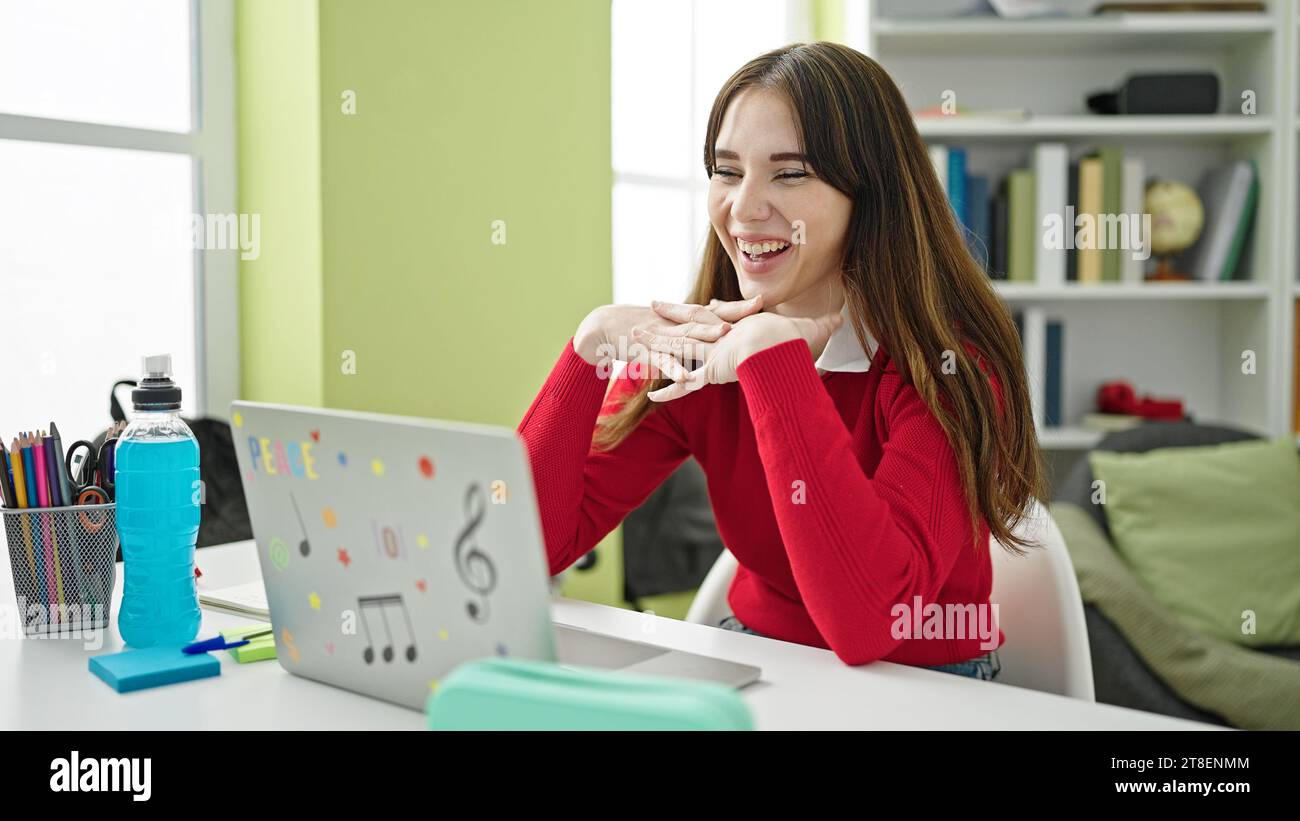 Young hispanic woman student smiling confident having video call at ...