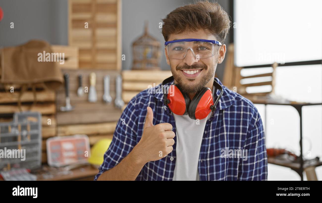 Handsome young arab man beaming hi-res stock photography and images - Alamy