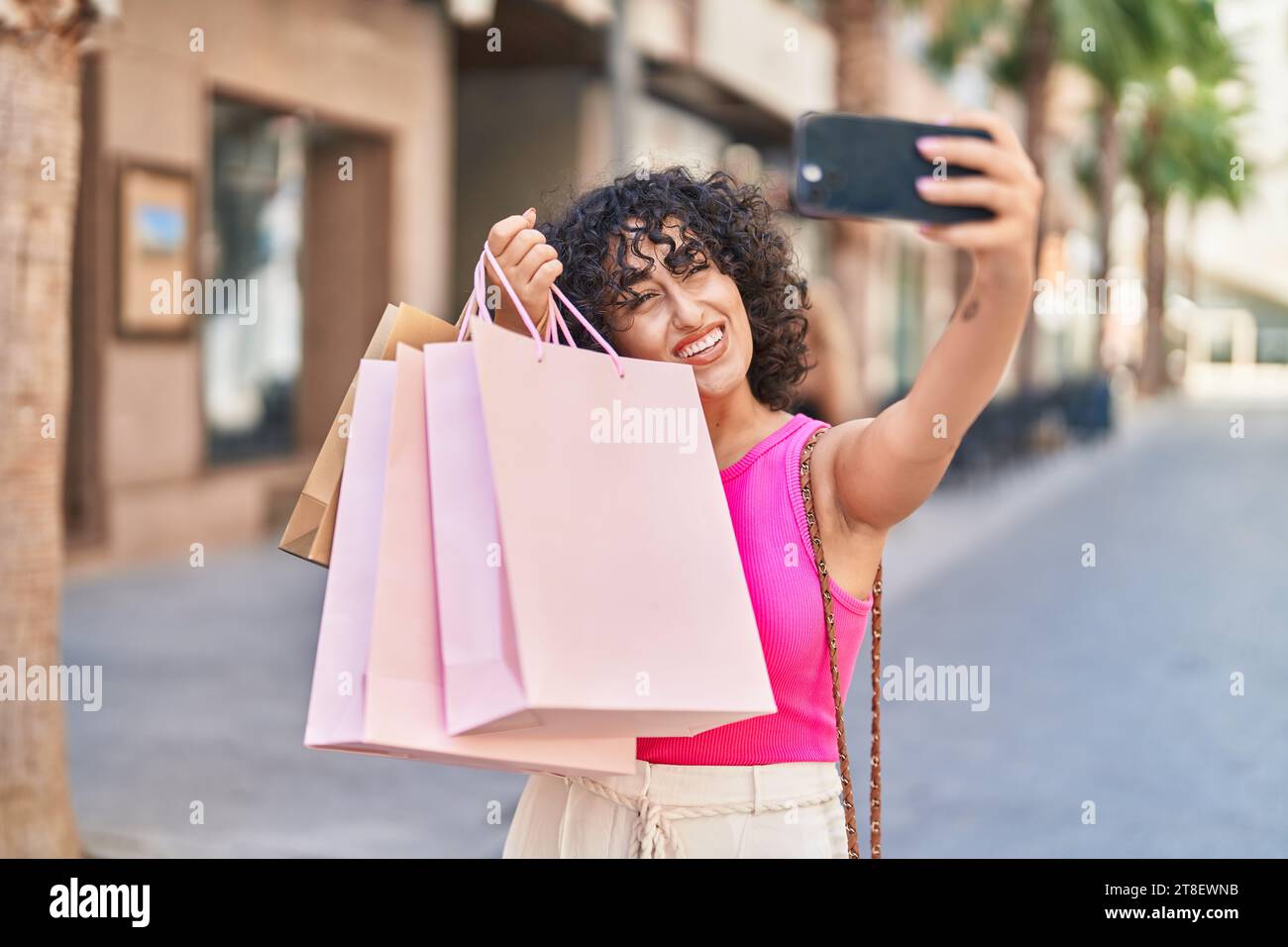 Young middle eastern woman customer smiling confident make selfie by ...