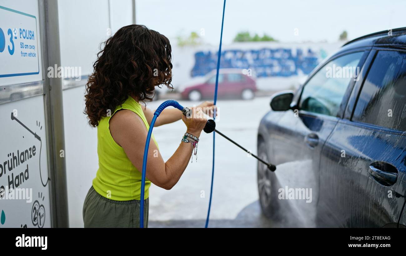 Mature woman pressure washer hi-res stock photography and images - Alamy