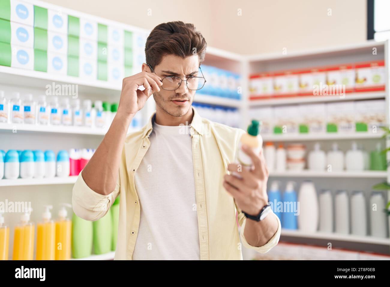 Reading label of shampoo hi-res stock photography and images - Alamy