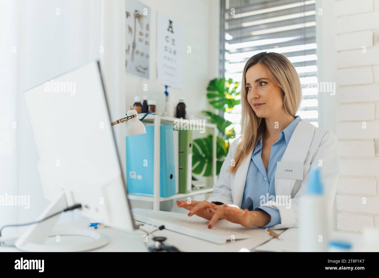 In ophthalmology clinic female doctor hi-res stock photography and ...