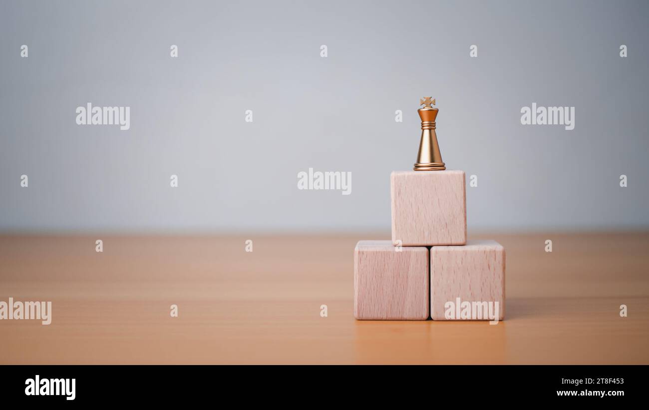 King placed on the topmost layer of wood. It represents the concept of ...