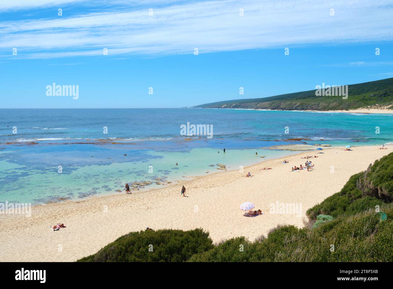 Yallingup Beach with turquoise waters on a sunny afternoon with people ...