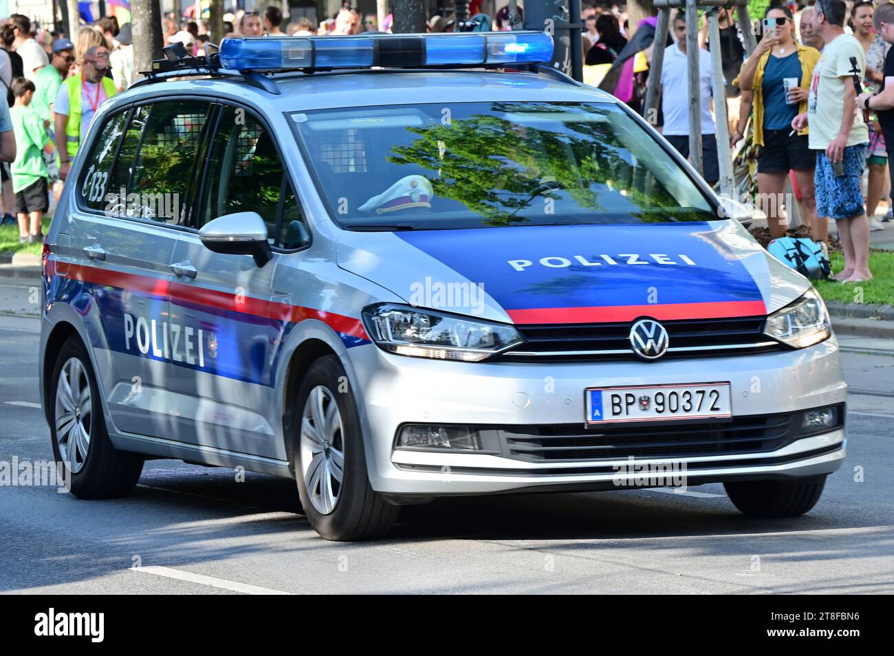 Police vehicle at a large demonstration (rainbow parade) in Vienna ...