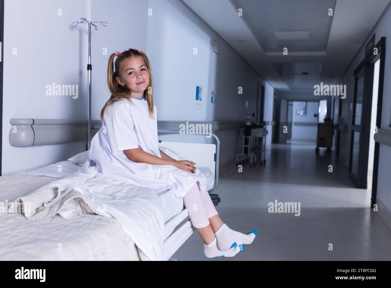 Girl sitting in hospital bed hi-res stock photography and images - Alamy