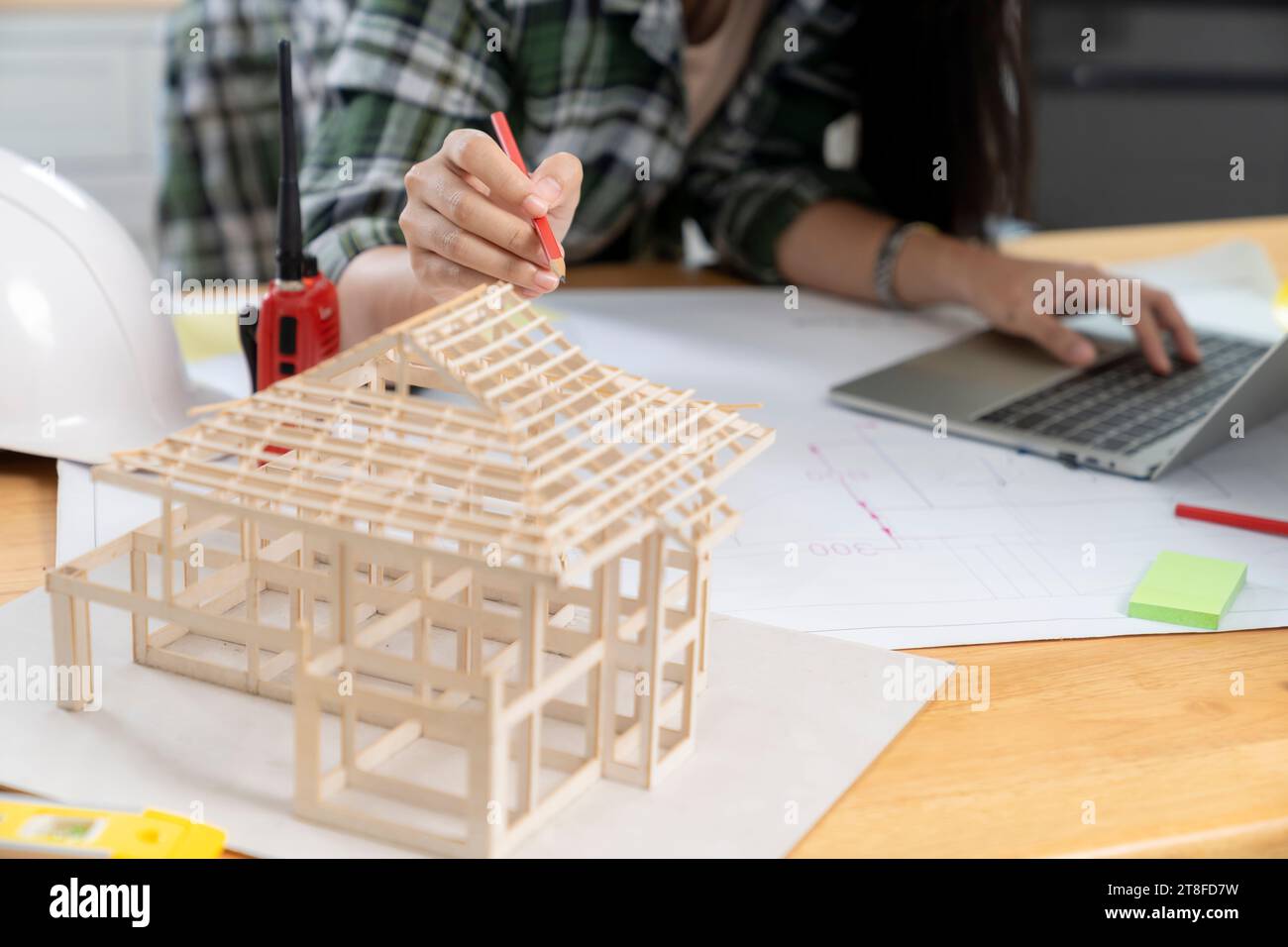 The collaborative work of a group of architects inspecting the ...