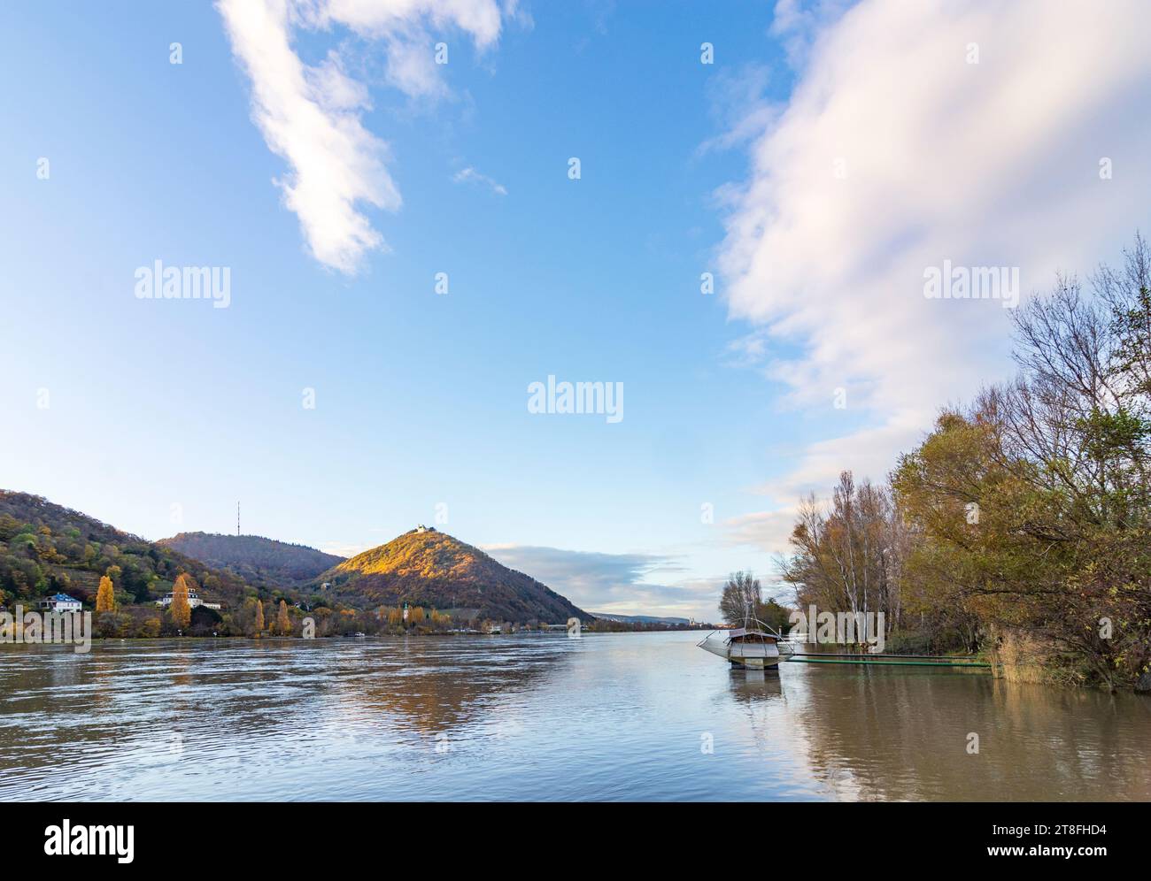 Vienna: flood at river Donau (Danube), mountains Kahlenberg and ...
