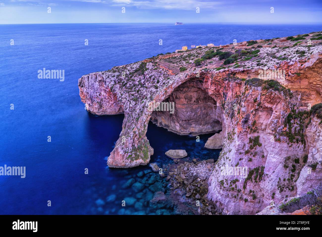 The Blue Grotto sea cavern at dawn in Malta, landmark cave in south ...