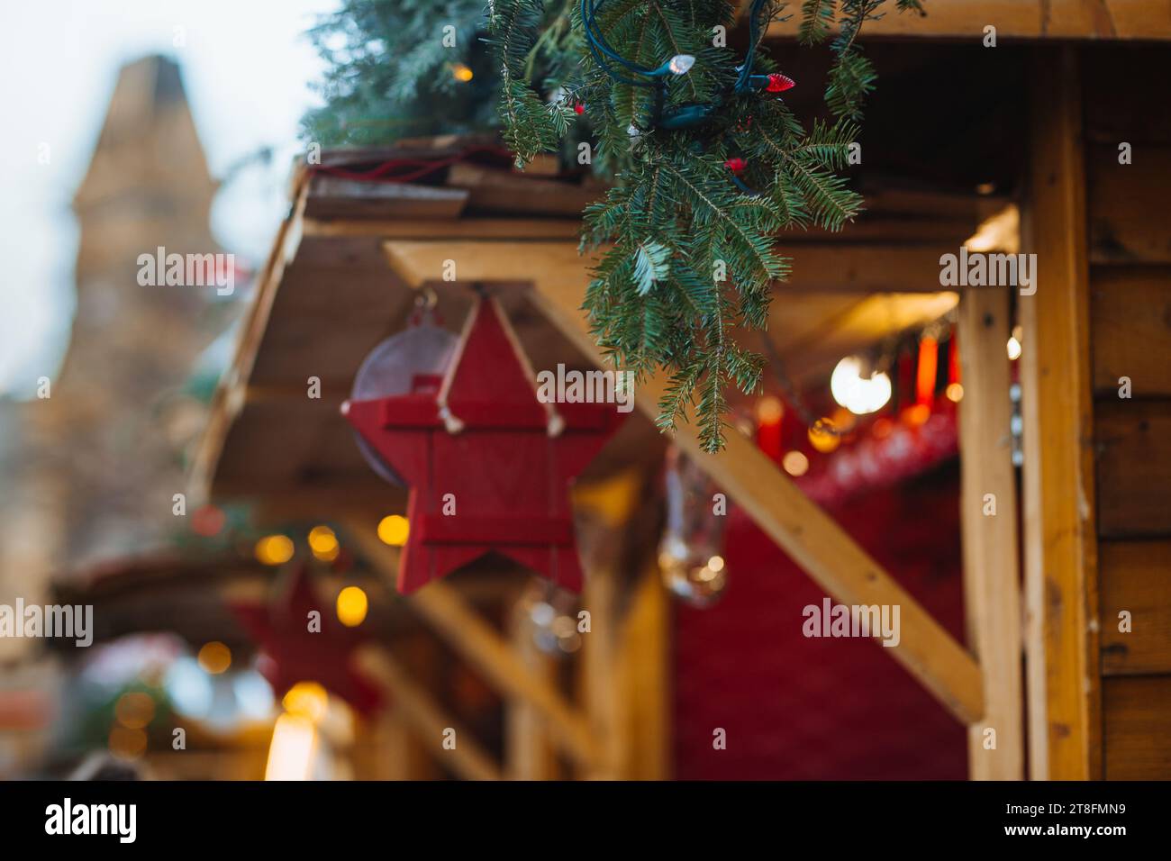 A cozy Christmas market stall adorned with festive decorations ...