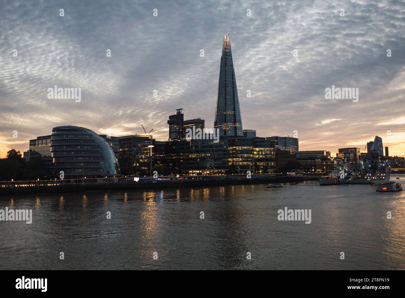 The London skyline during twilight, featuring The Shard and the City ...