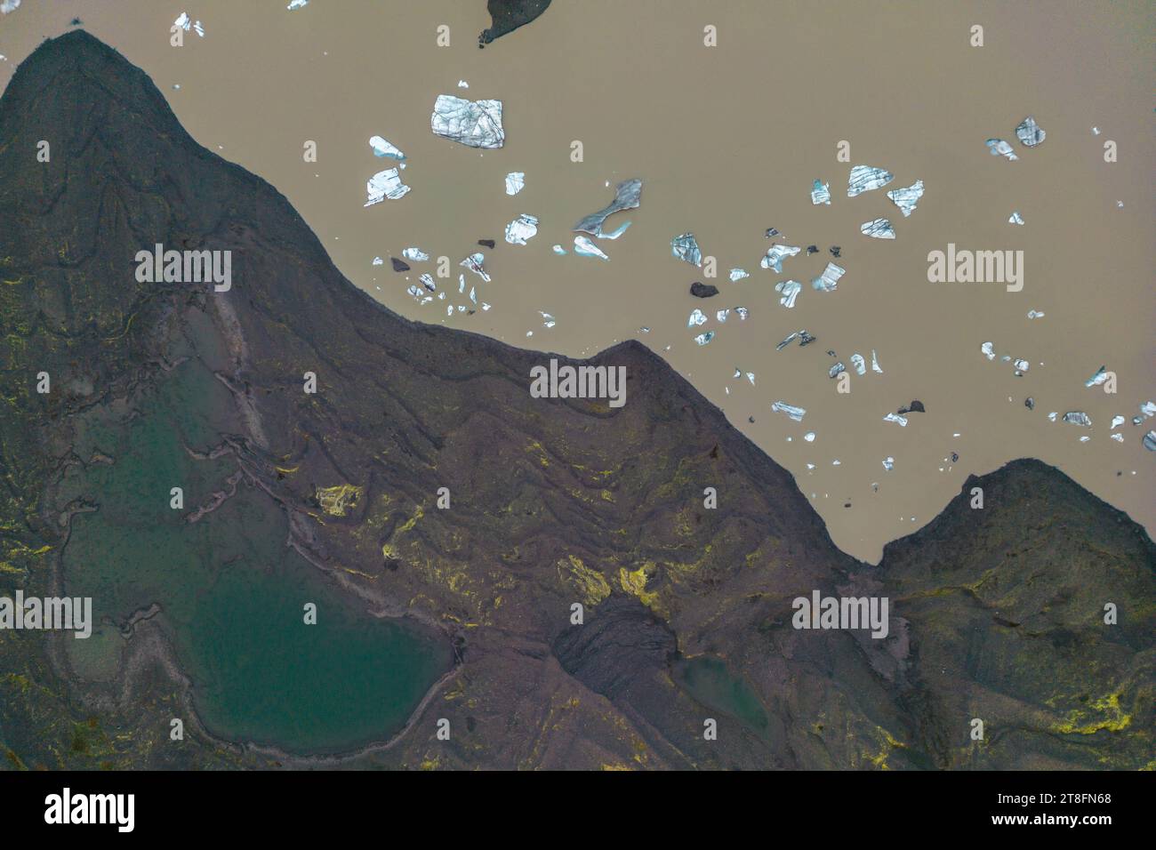 An aerial view showcasing a mix of waterways, mossy terrain, and ...