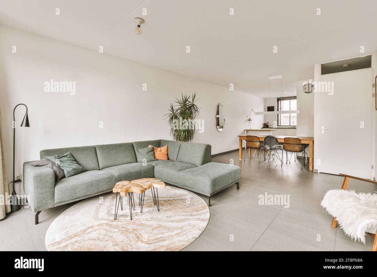 Large comfortable sofa in spacious living room of contemporary house ...