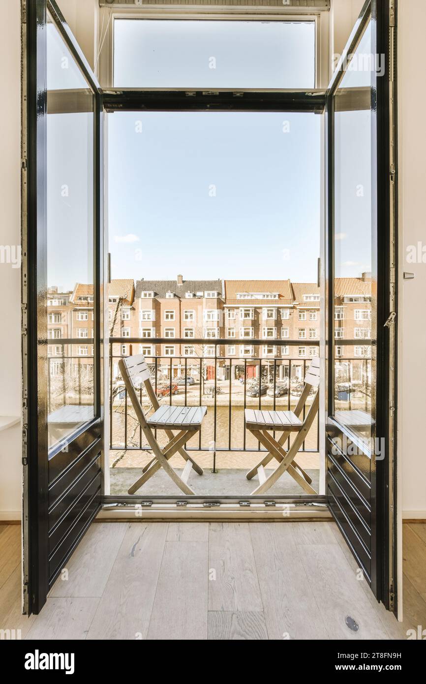 Open doors leading to the balcony hi-res stock photography and images ...