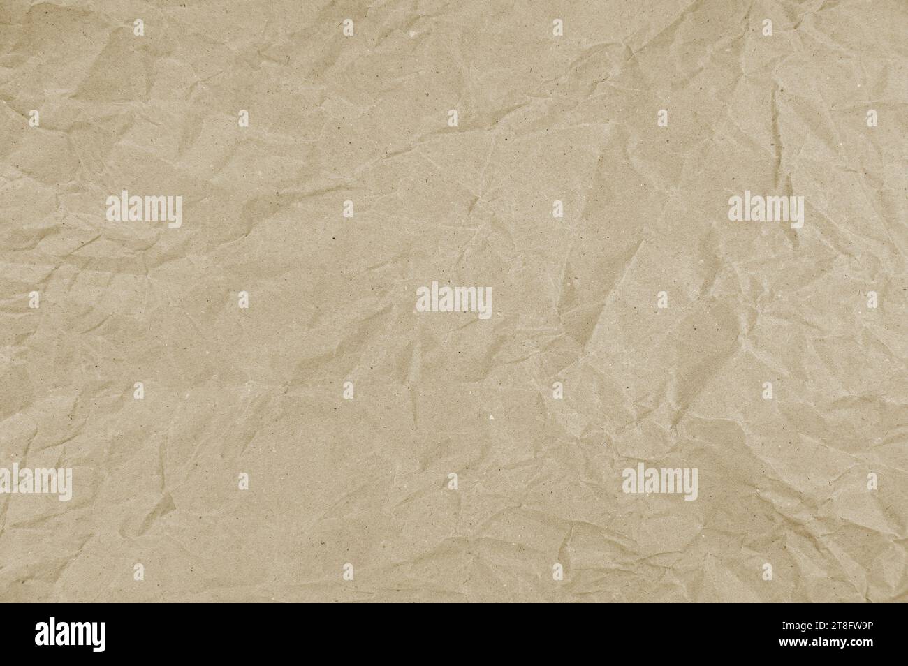 Tactile texture of crumpled beige paper. Wrinkled wrapping paper ...