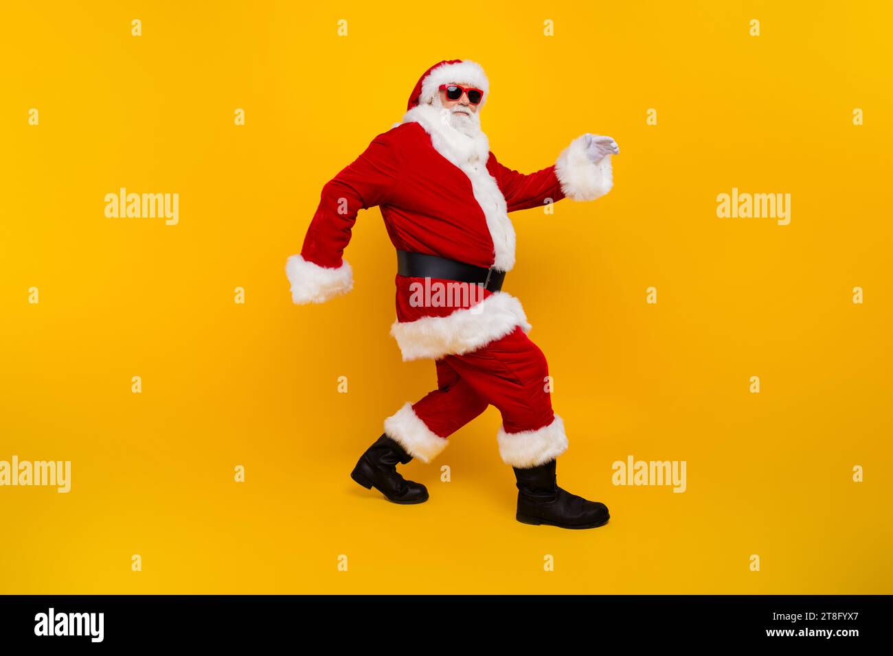 Full size profile portrait of eccentric aged santa claus sneaky walking ...