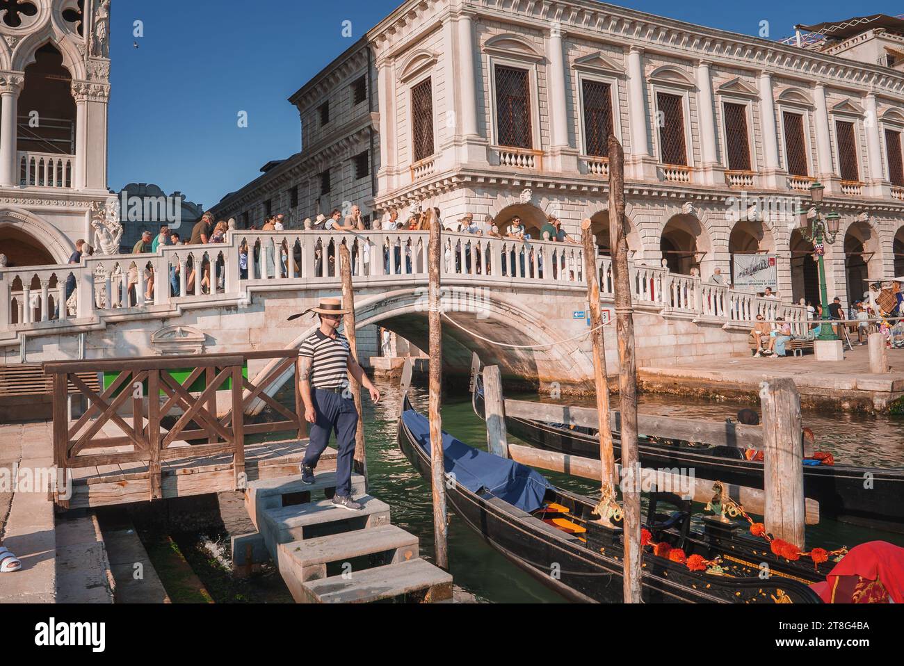 Bustling Grand Canal in Venice, Italy with Gondolas Floating on Water ...