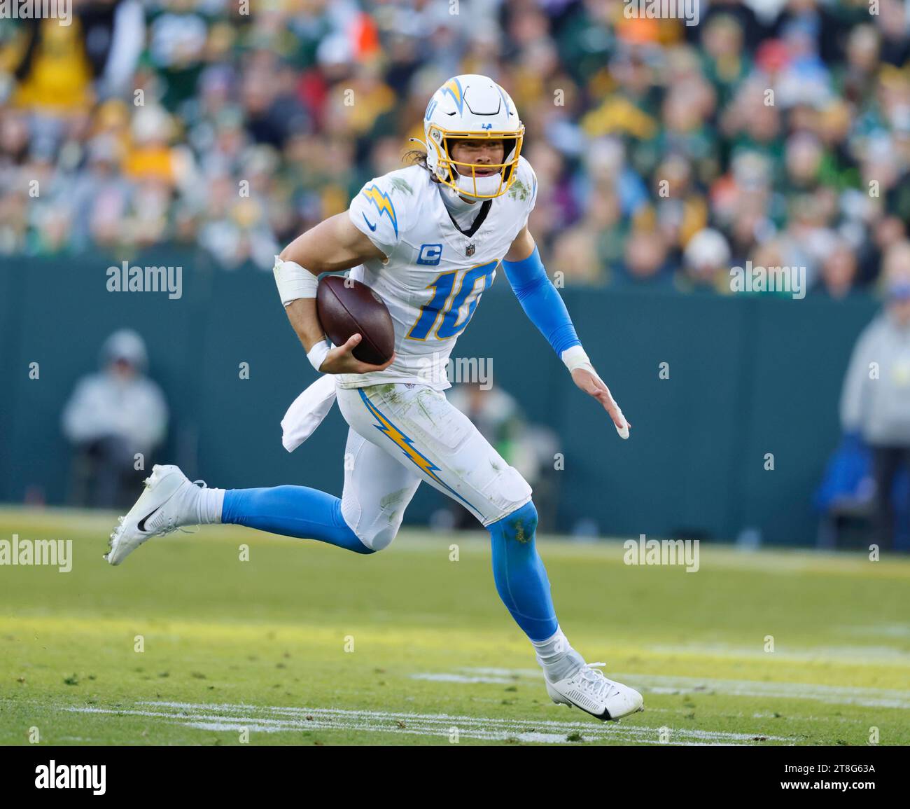 Los Angeles Chargers quarterback Justin Herbert (10) runs with the ball ...