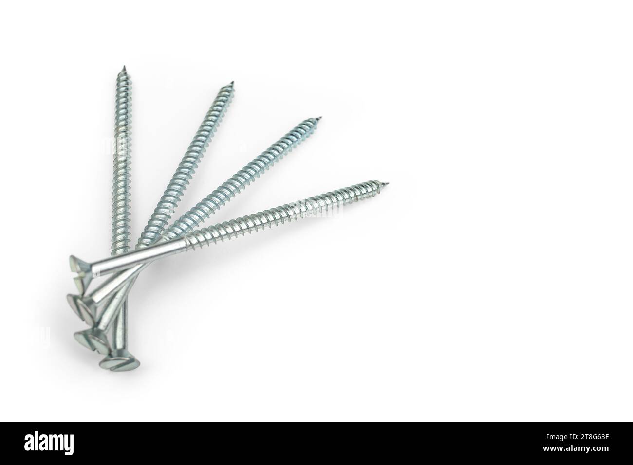 Four long screw bolt nails arranged like a fan, isolated on white Stock ...