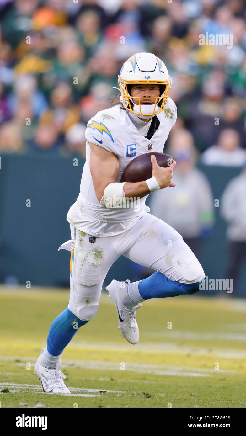 Los Angeles Chargers quarterback Justin Herbert (10) runs with the ball ...