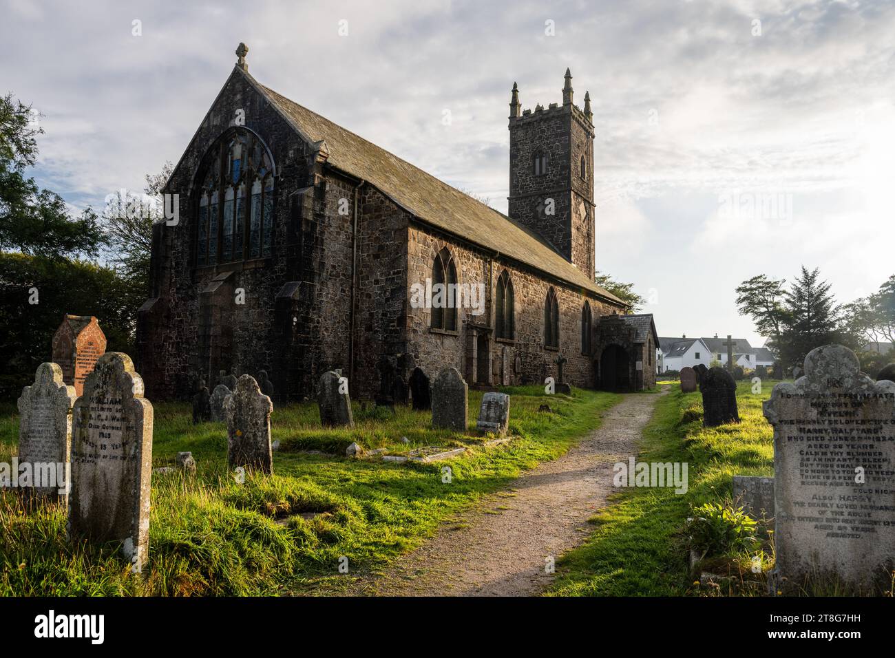 Evening sun shines on St Michael's Church in the Dartmoor village of ...