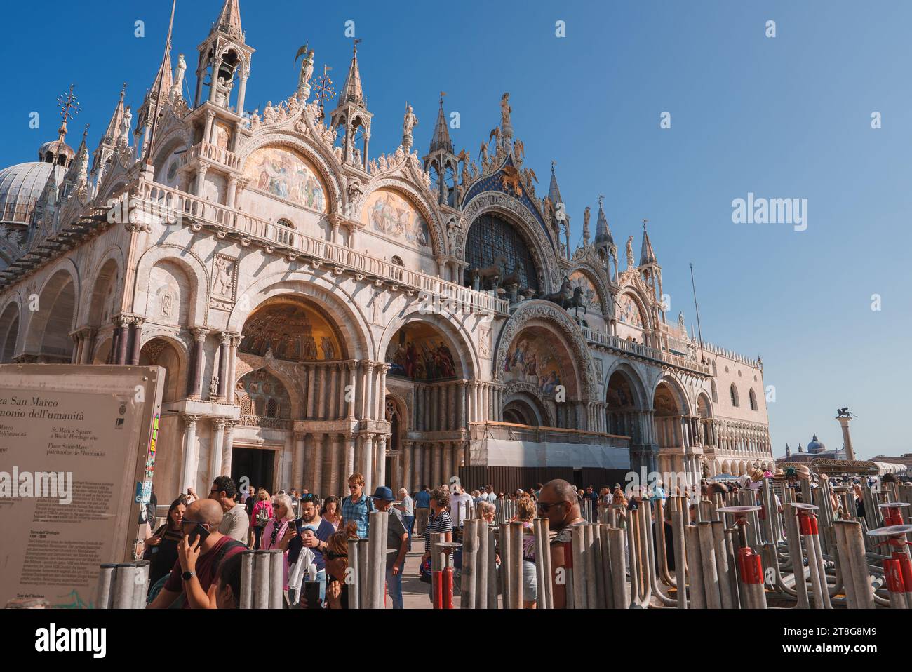 Group of People Standing in Front of Ornate Cathedral in Venice, Italy ...