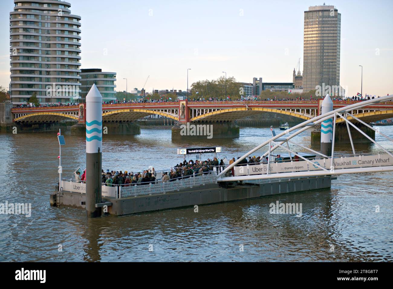 Passengers wait to embark on a river taxi at Vauxhall Pier (St George ...