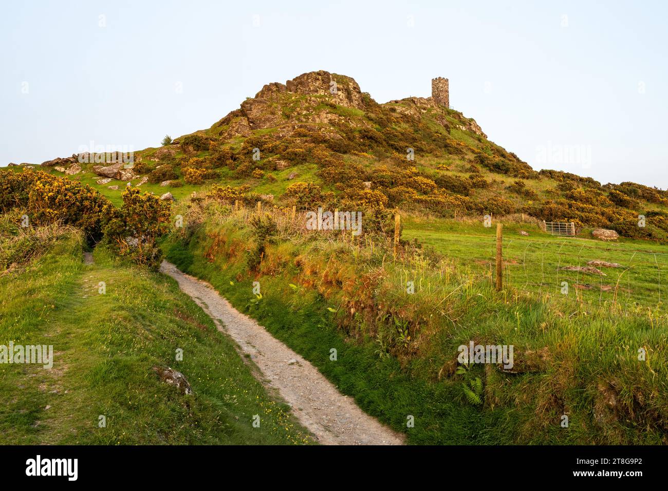 The hilltop church of Brent Tor is lit at dusk in Dartmoor, Devon Stock ...
