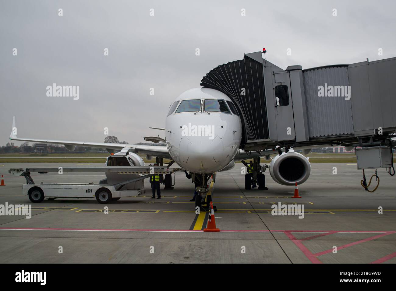 Aircraft shortly after arrival parked at the gate with an airbridge ...