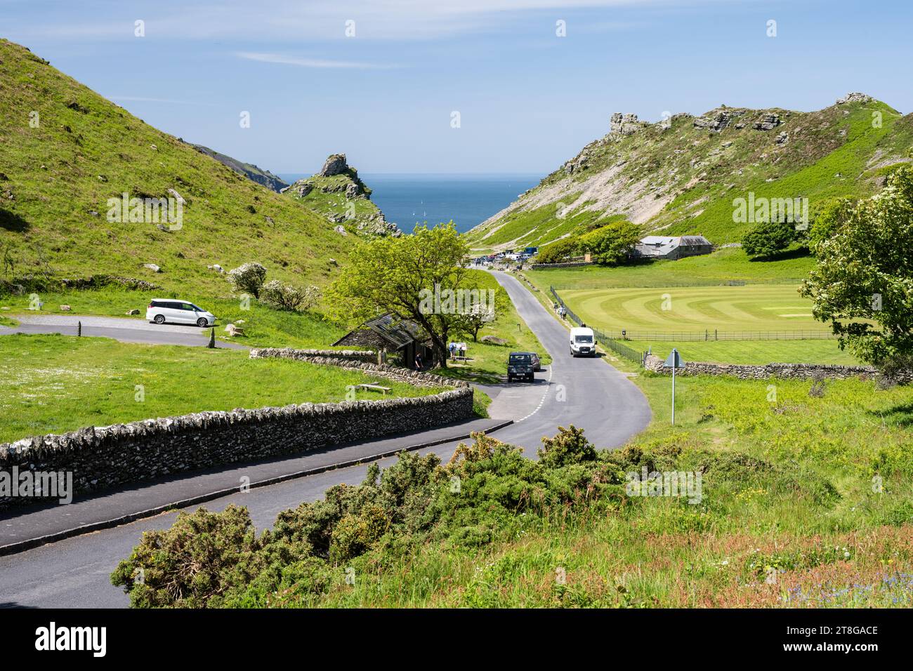 Sun shines on the rugged cliffs of the Valley of Rocks at Lynton on the ...