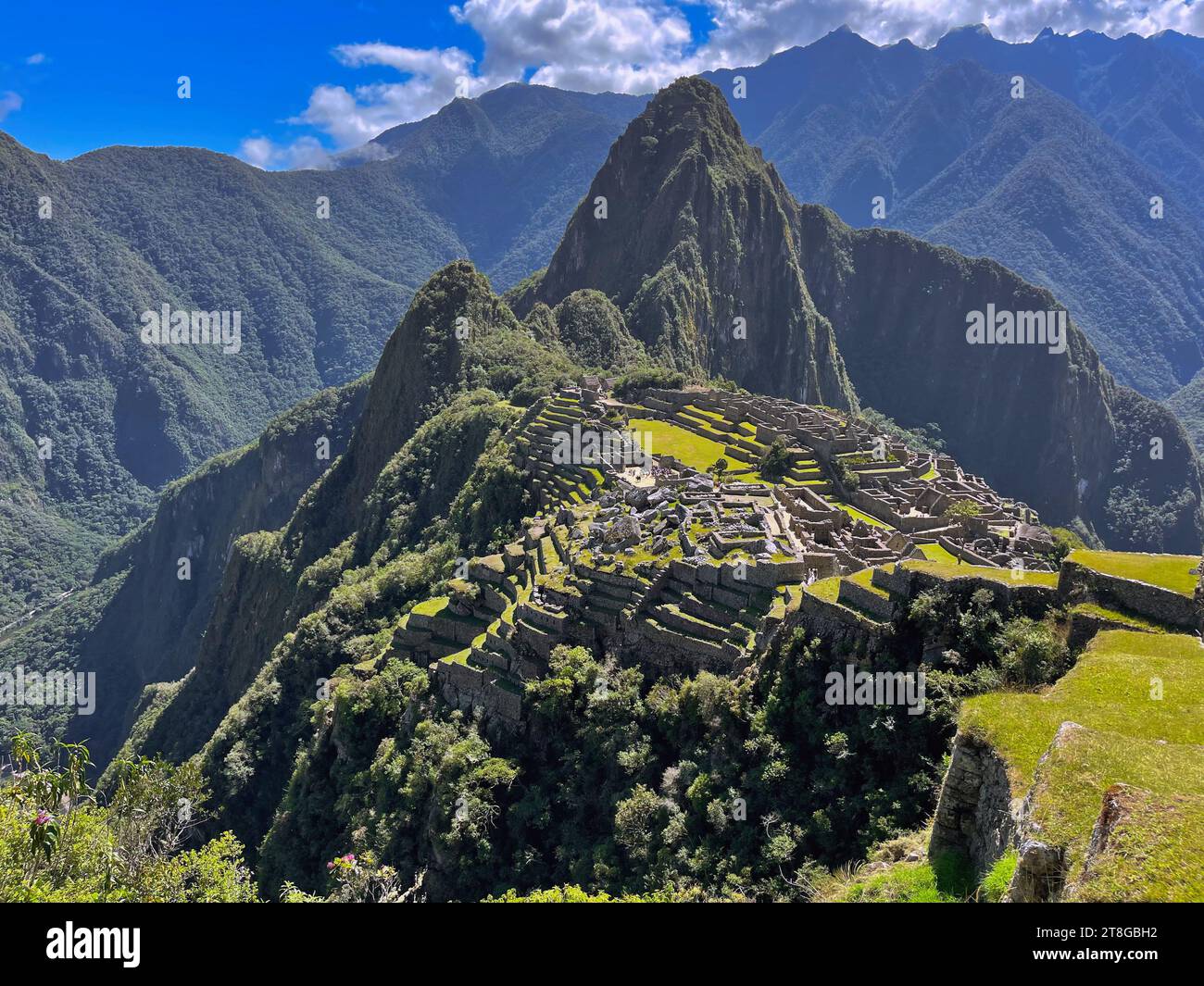 An aerial view of an Inca village situated against a backdrop of ...