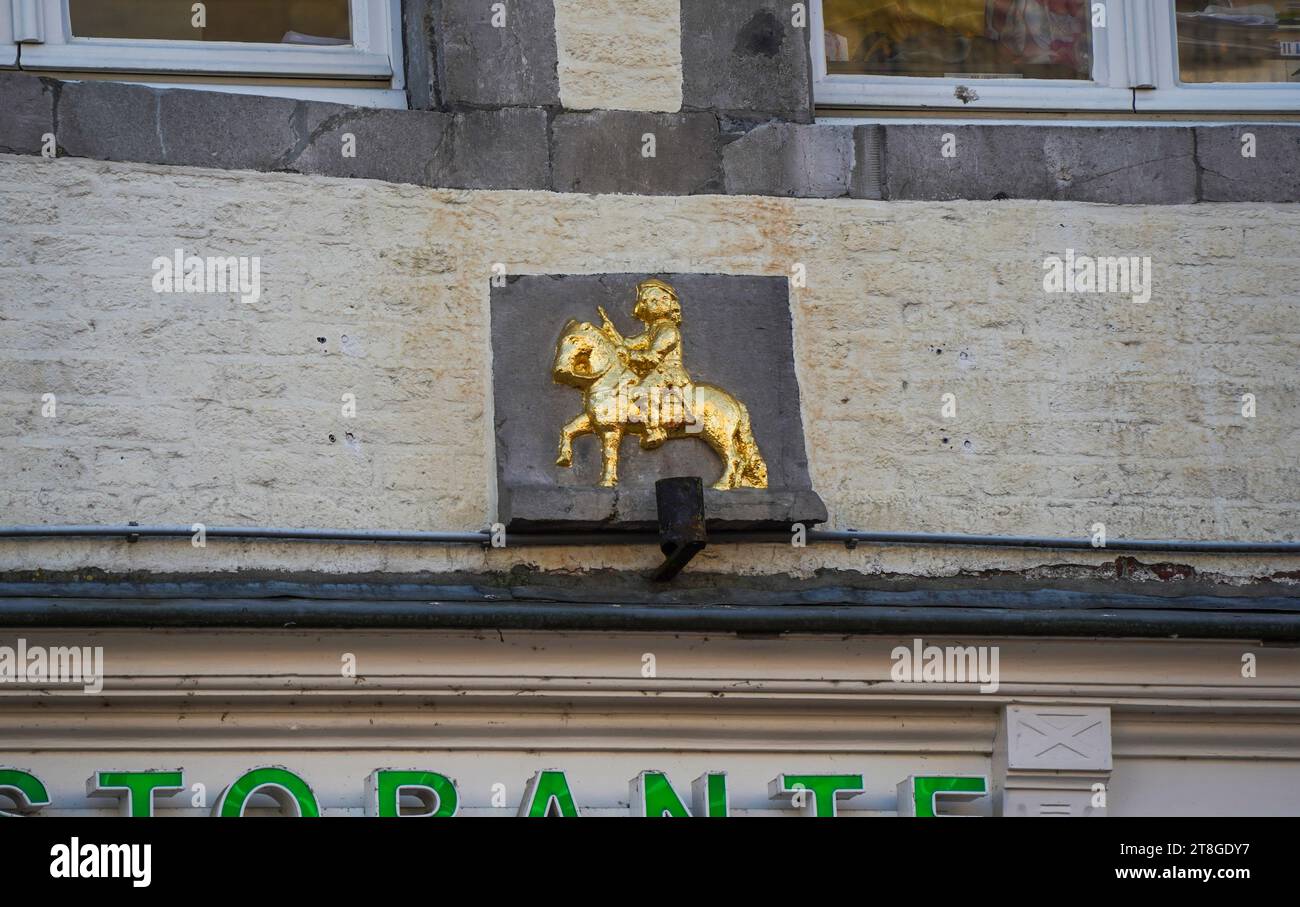 Gable stones, plaque depicting Little prince of orange on old building ...