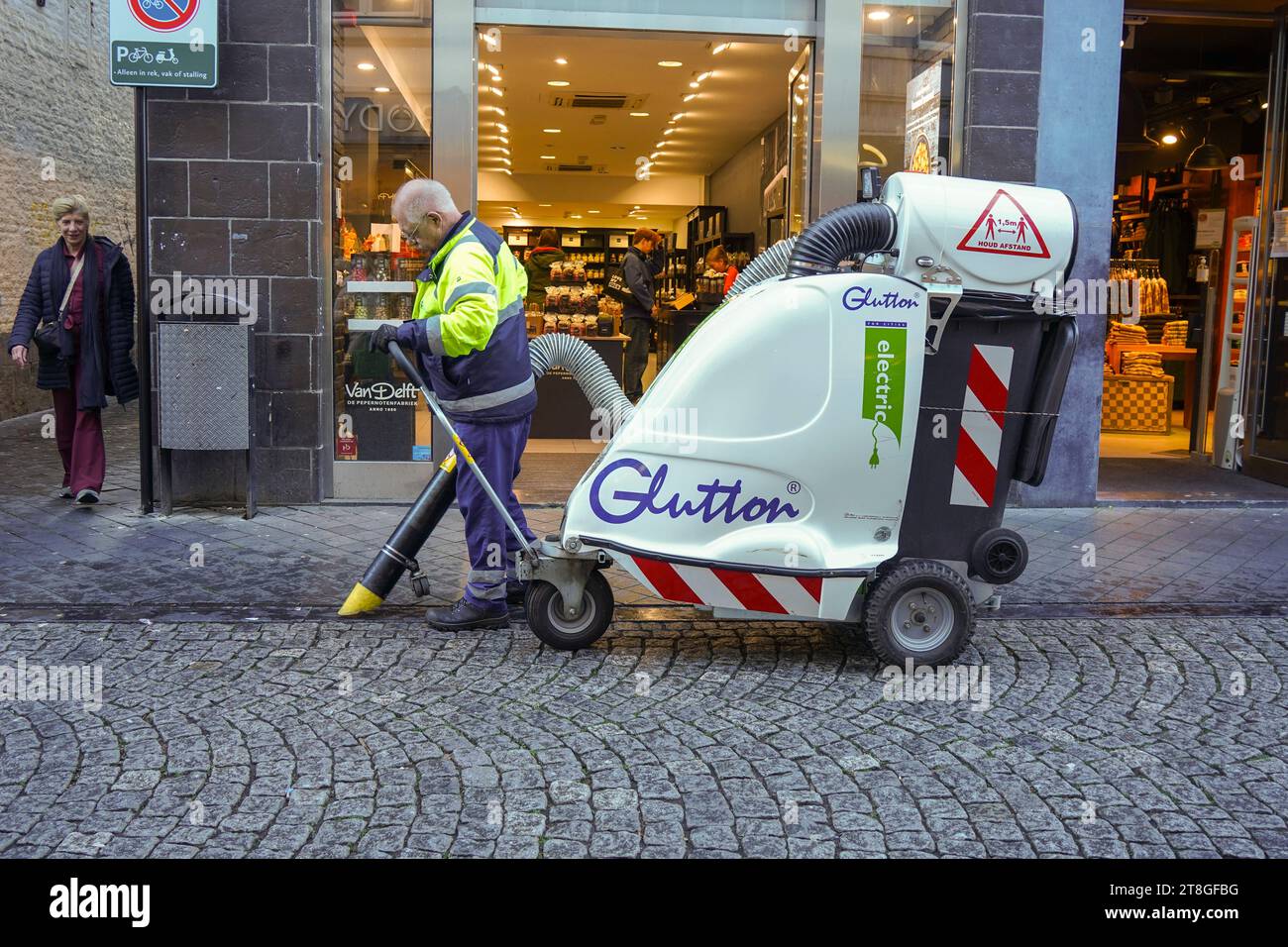 Man with Electric Street Vacuum, cleaning streets in Netherlands Stock ...