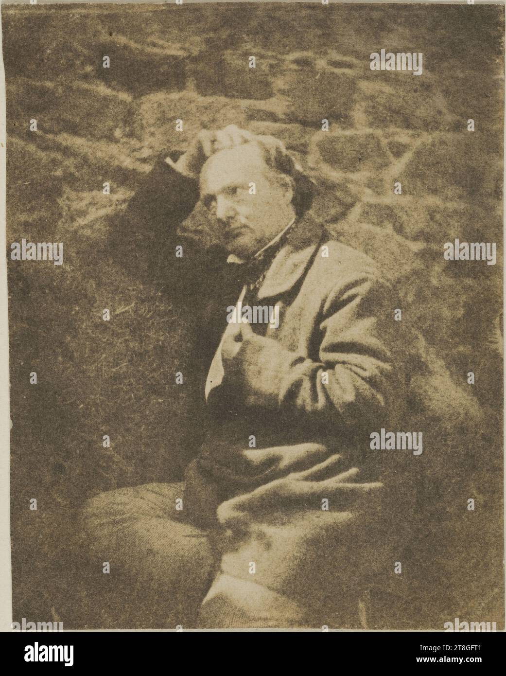 Victor Hugo seated in profile, leaning against a stone wall, Atelier de ...
