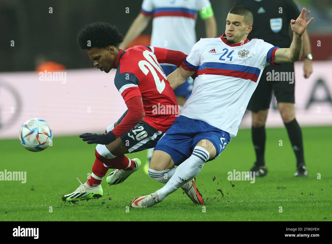 Cuba's Cristian Valiente, left, and Russia's Alexander Chernikov challenge for the ball during ...