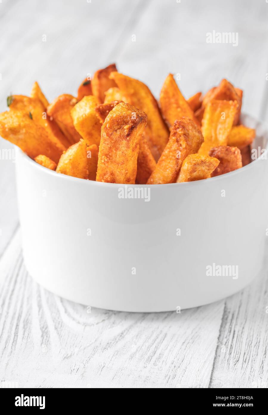 Bowl of garlic parmesan paprika french fries Stock Photo - Alamy