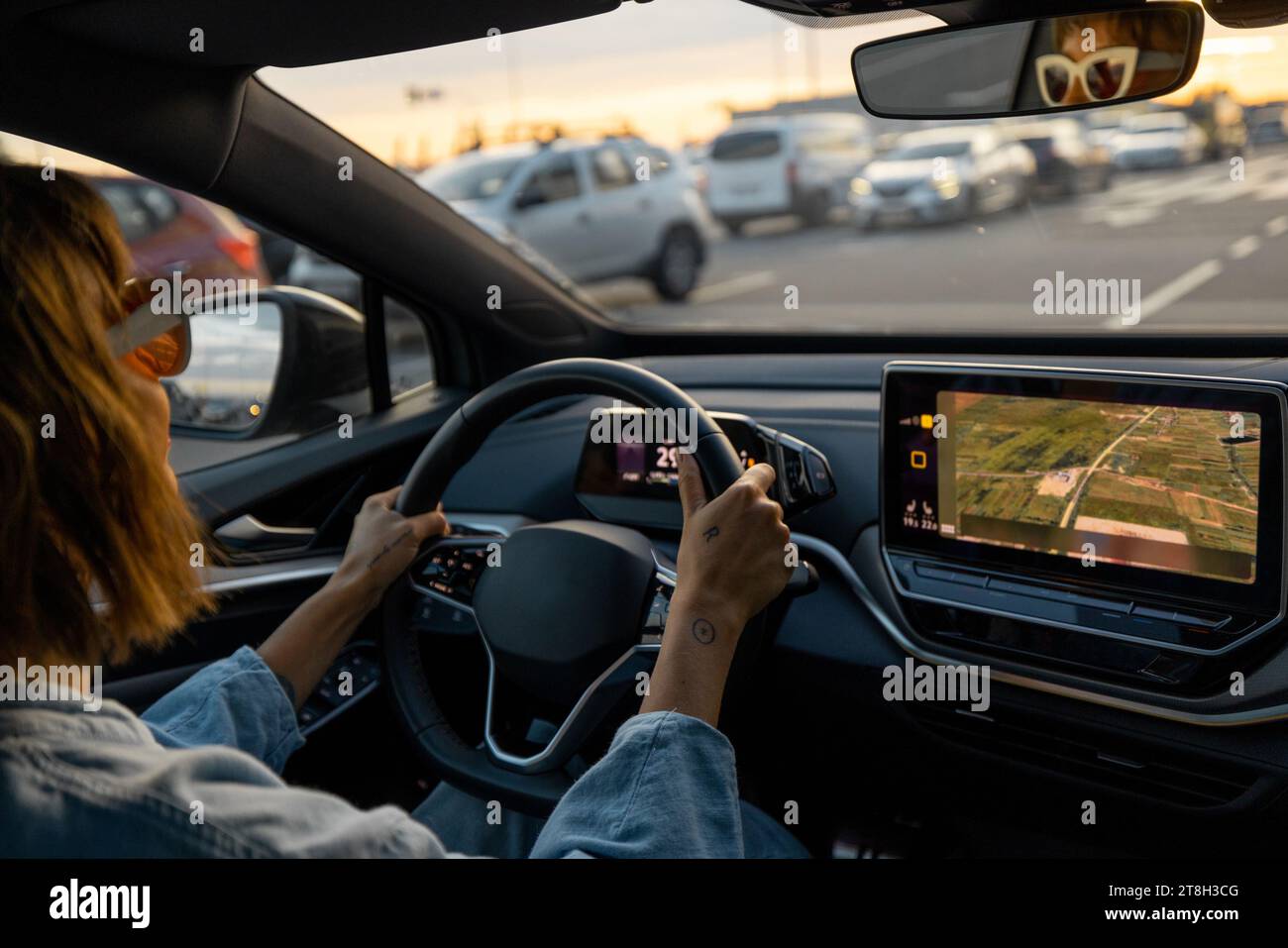 Cheerful woman drives car hi-res stock photography and images - Alamy