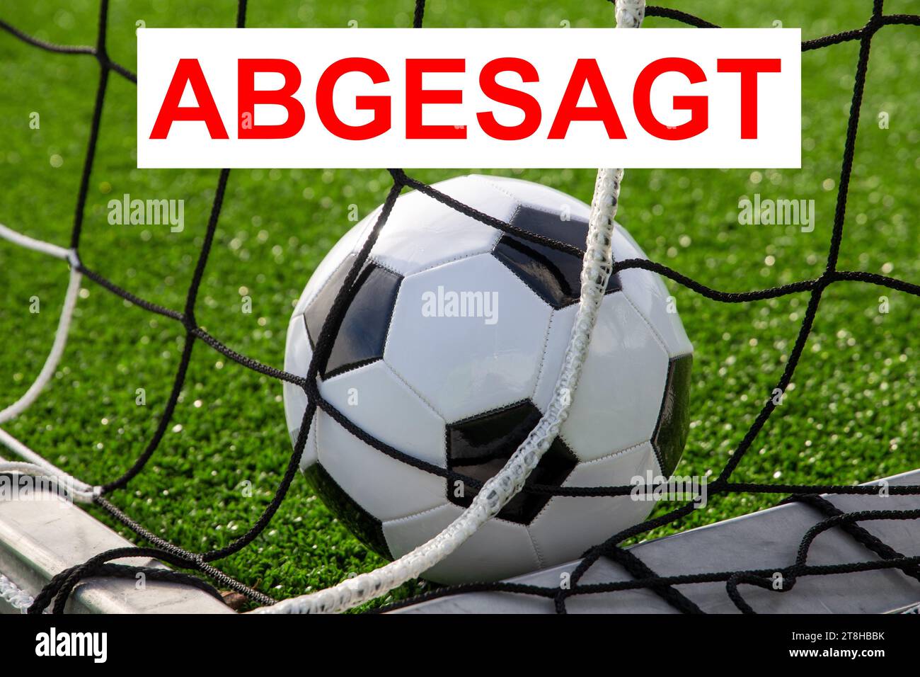 Symbol image of football match cancellation with German text ABGESAGT ...
