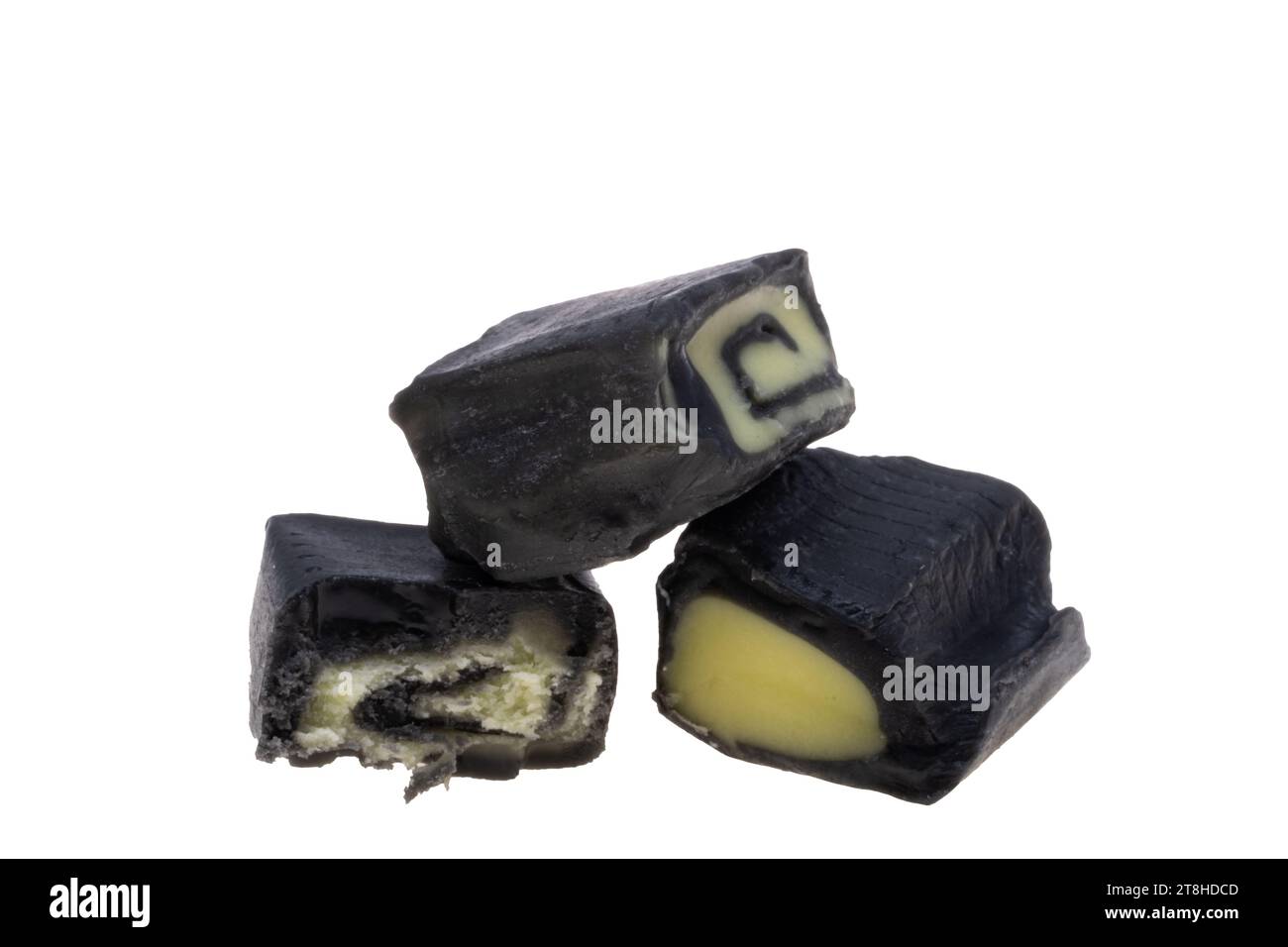 black mint candies isolated on white background Stock Photo - Alamy
