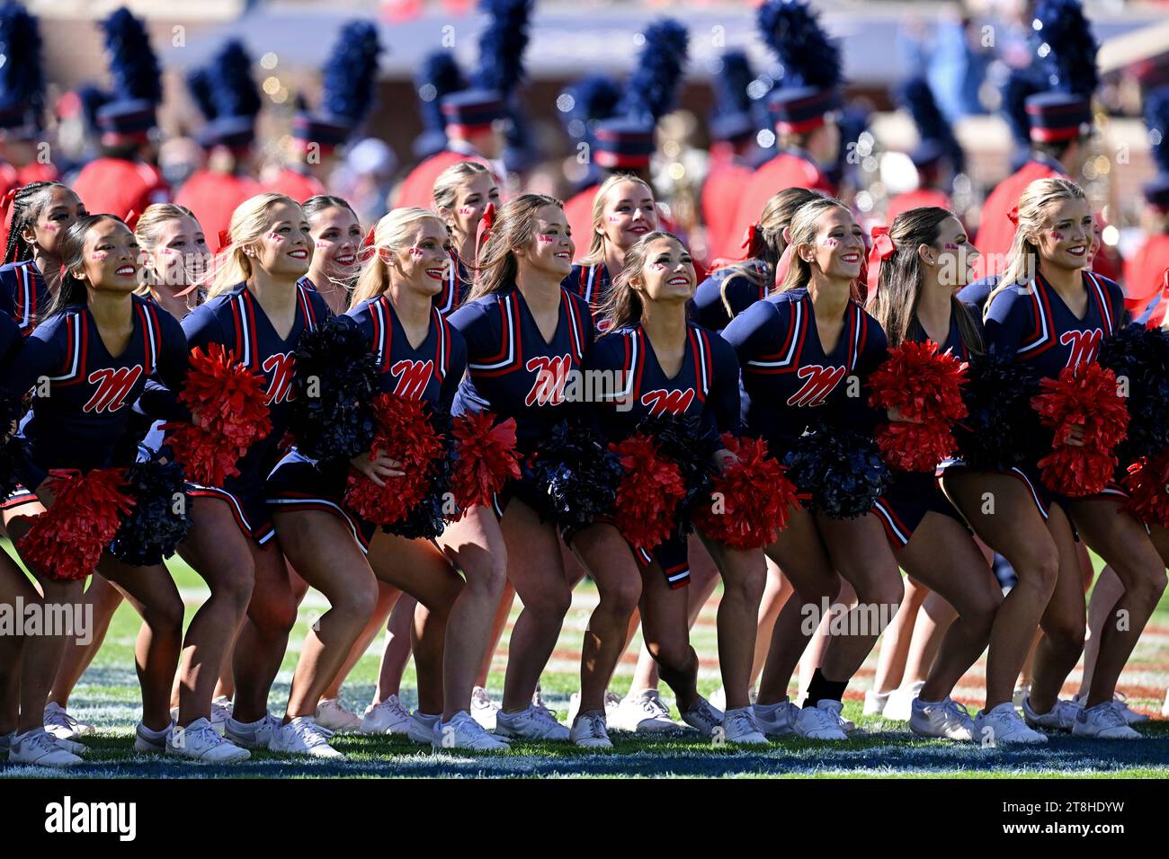 Mississippi cheerleaders cheer before an NCAA college football game ...